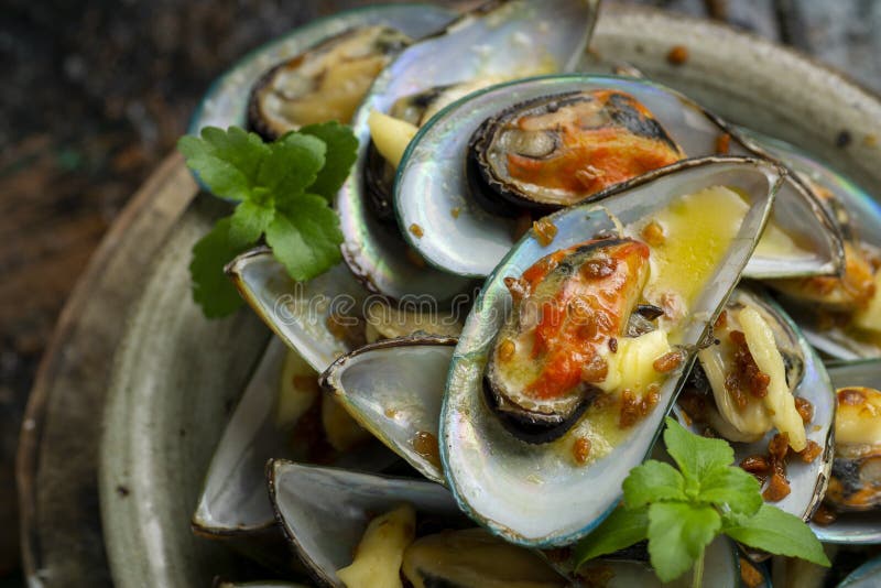 Baked Shellfish with Butter and Fried Garlic Stock Image - Image of ...