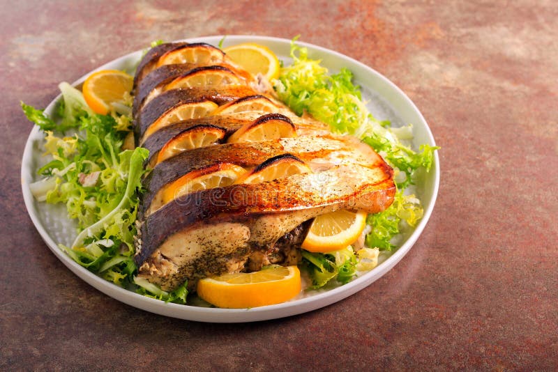 Baked silver carp fish stock photo. Image of homemade - 213891742