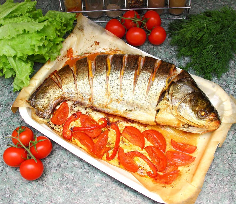 Raw Silver Carp with Tomato and Lemon Stock Photo - Image of crucian ...