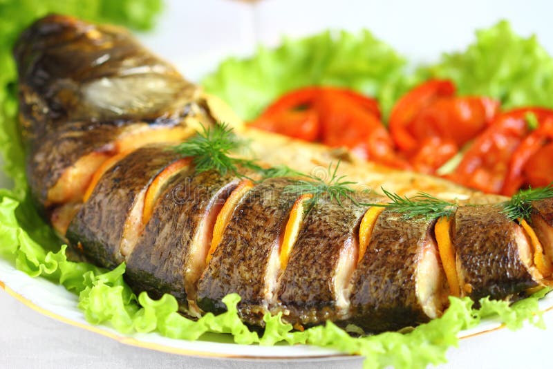 Baked Silver Carp with Tomato and Lemon Stock Image - Image of kernel ...