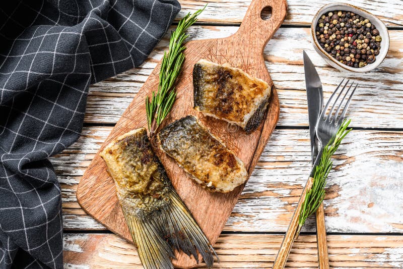 Baked Sliced Silver Carp. Wooden Background Stock Image - Image of ...