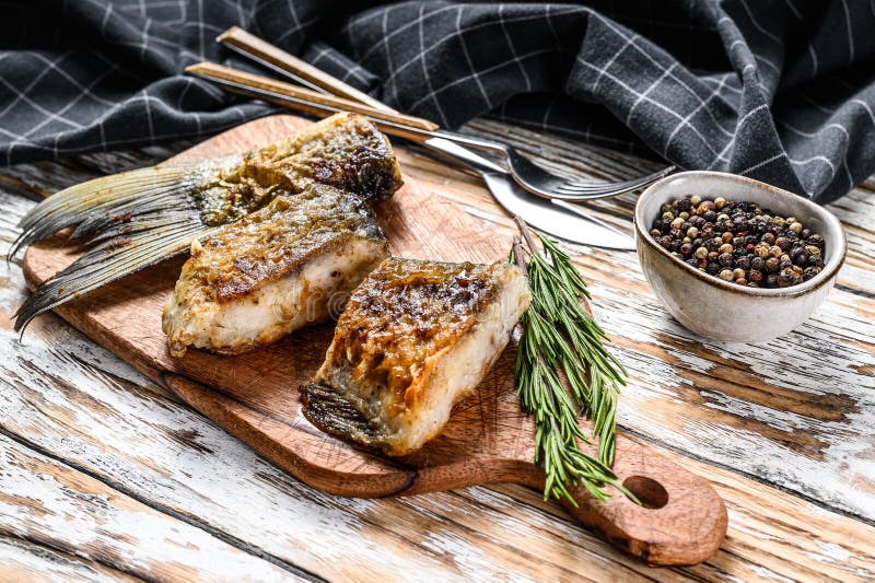 Baked Sliced Silver Carp. Wooden Background Stock Image - Image of ...