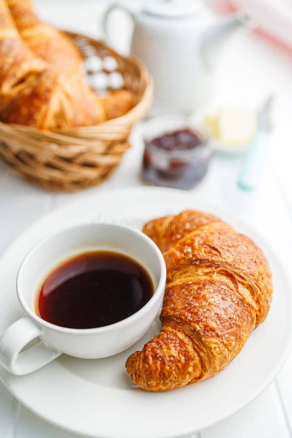 Baked Tasty Croissant and Coffee Cup on White Table Stock Image - Image ...