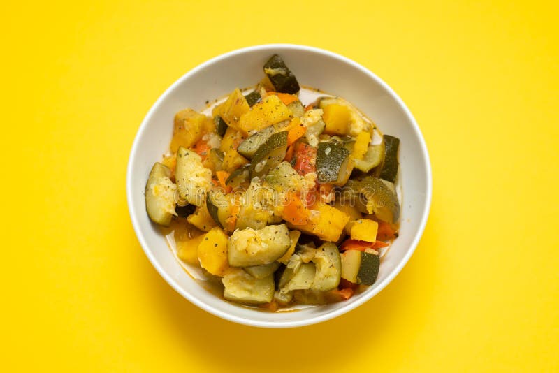 Baked Vegetables in Big White Bowl on Yellow Stock Image - Image of ...
