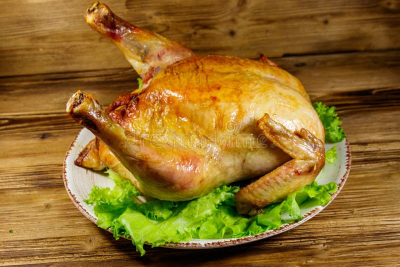 Baked Whole Chicken on Wooden Table Stock Photo - Image of eating ...