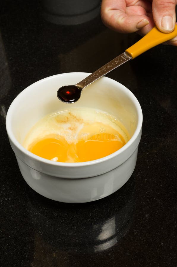 Baker Adding Ingredients To Mix Stock Photo - Image of spoons, white ...