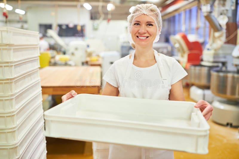 Baker Apprentice in Training Carries an Empty Box Stock Photo - Image ...