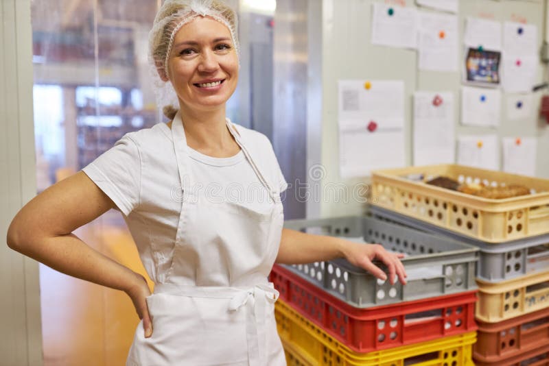 Baker Apprentice in Training Stands Next To Stack of Boxes Stock Image ...