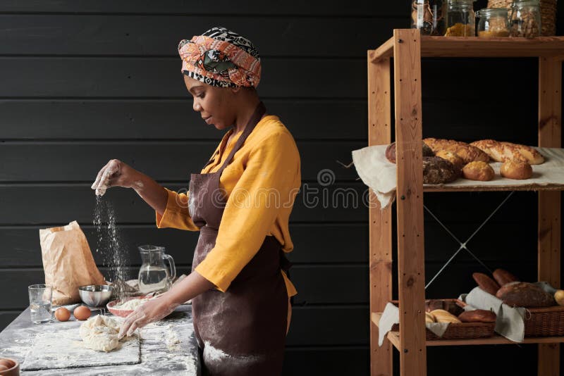 Baker baking the bread stock image. Image of baking - 219836103