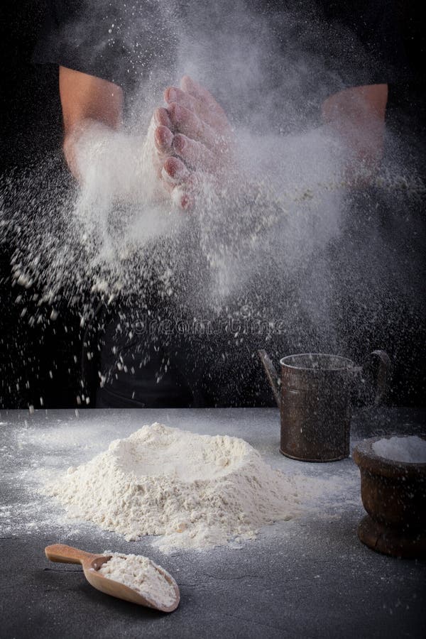 The Baker is Clapping Hands Covered with Flour Stock Photo - Image of ...