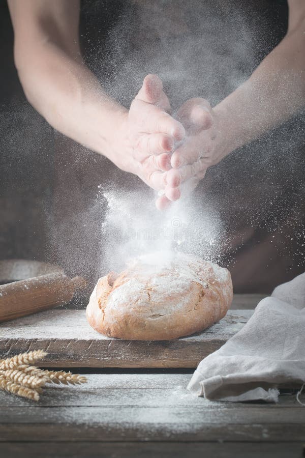 Baker cooking bread. stock photo. Image of brown, healthy - 156336250