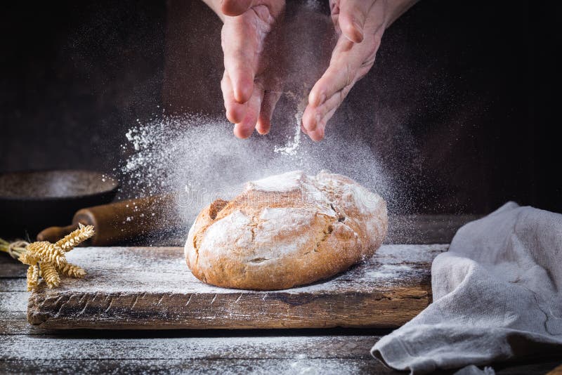 Baker cooking bread. stock image. Image of bake, baked - 145670101