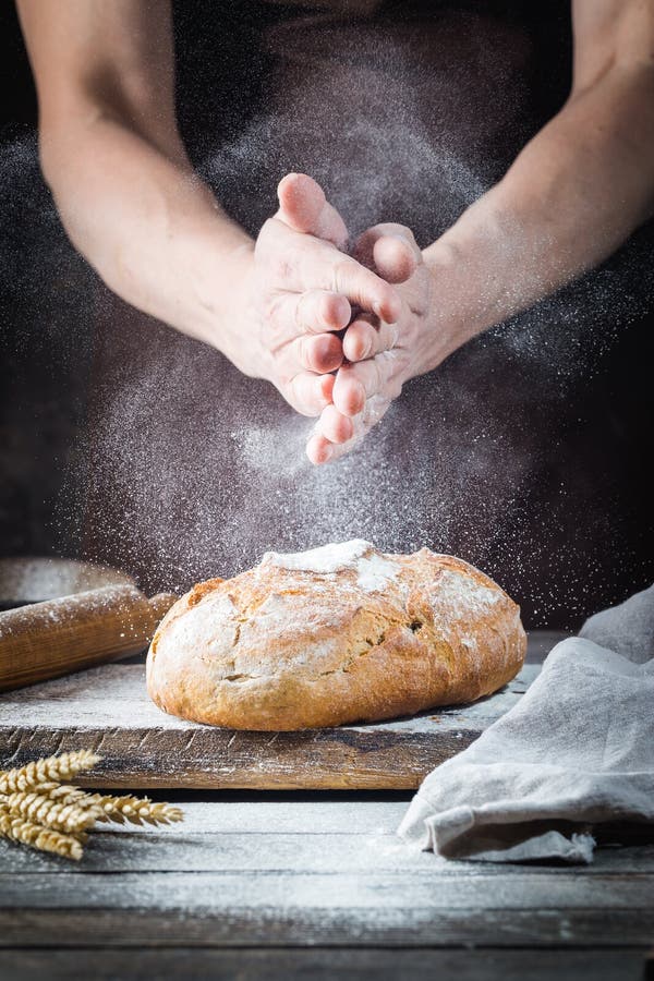 Baker cooking bread. stock photo. Image of brown, healthy - 156336250