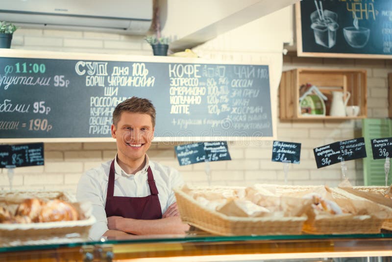 Baker at the counter stock image. Image of male, business - 91058559