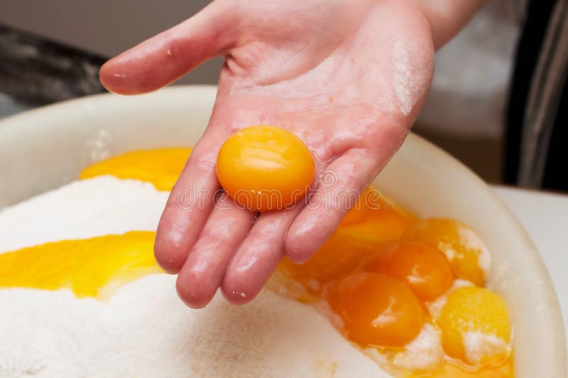 Baker cracking an egg. stock image. Image of knife, kitchen - 31725925