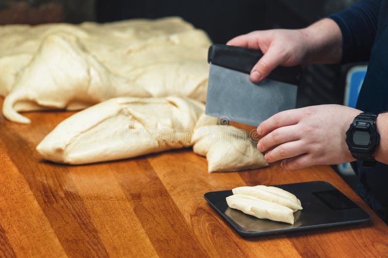 Baker Cutting and Weighing Dough Stock Image - Image of bread, measure ...