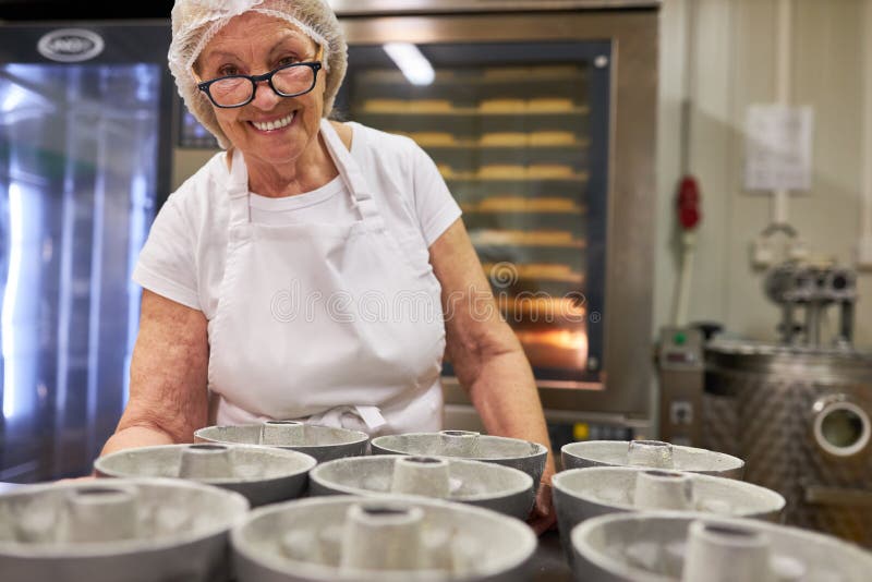 Baker with Experience in Baking Gugelhupf Cakes Stock Photo - Image of ...