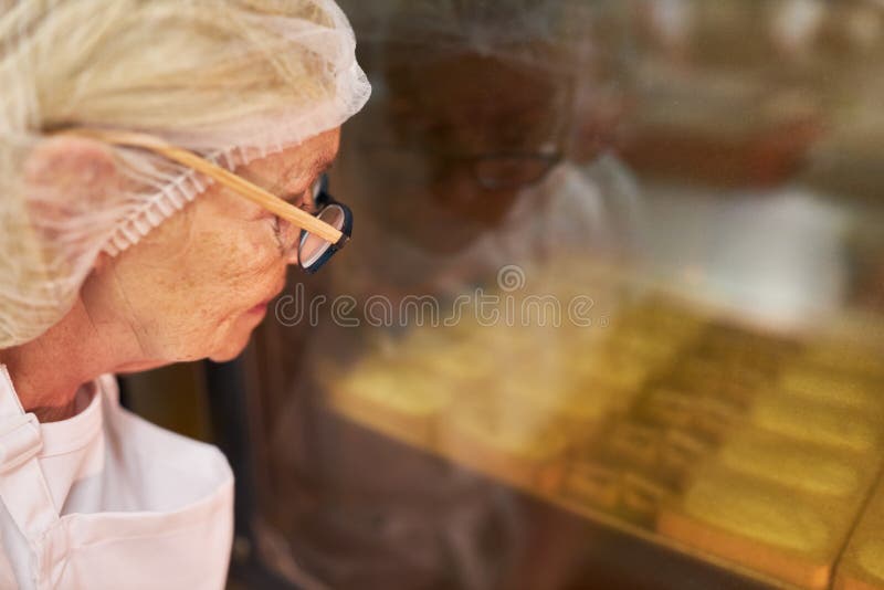 Baker with Experience Controls Baking in the Oven Stock Image - Image ...