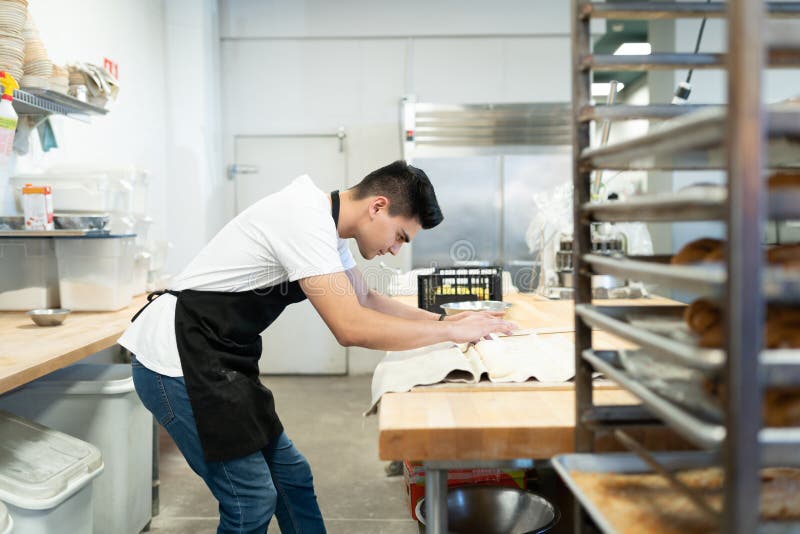 Baker Focused on His Work in a Bakery Stock Image - Image of industrial ...
