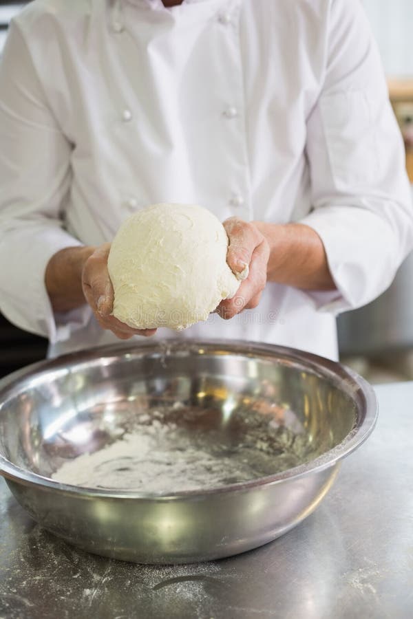Baker Forming Dough in Mixing Bowl Stock Image - Image of baker, chef ...
