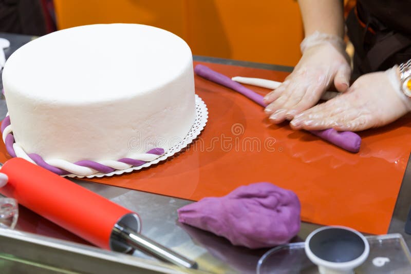 Baker with gum paste stock image. Image of decorate, baking - 72467731
