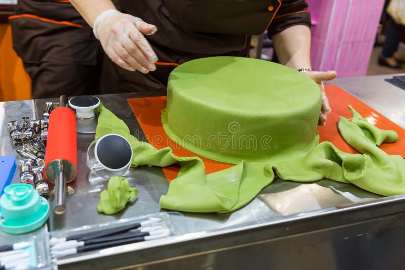 Baker with gum paste stock image. Image of cream, decorate - 72468217