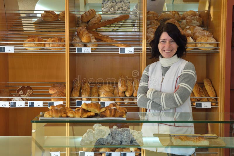 A baker in her bakery stock photo. Image of industry - 121624196