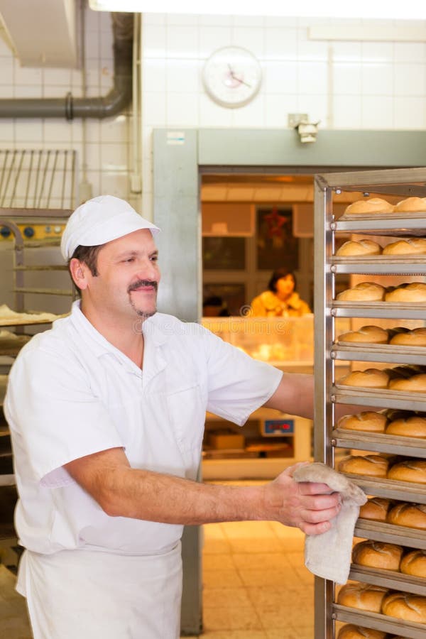 Baker in His Bakery Baking Bread Stock Photo - Image of clothes, bakery ...