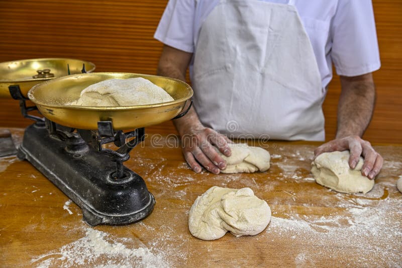 Baker Kneading Artisan Bread in the Bakery. Stock Image - Image of ...