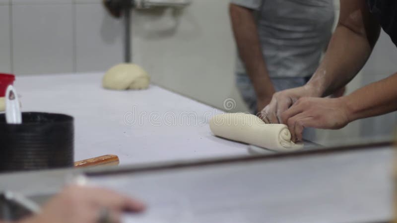 Baker kneading bread dough stock footage. Video of preparation - 281940384