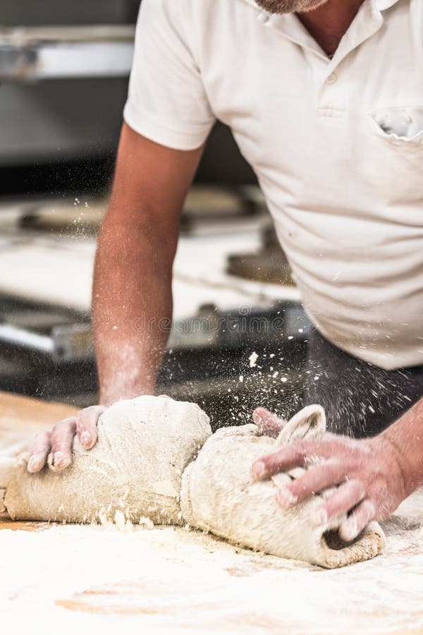 A Baker Kneads Bread Dough in the Bakery Stock Image - Image of ...