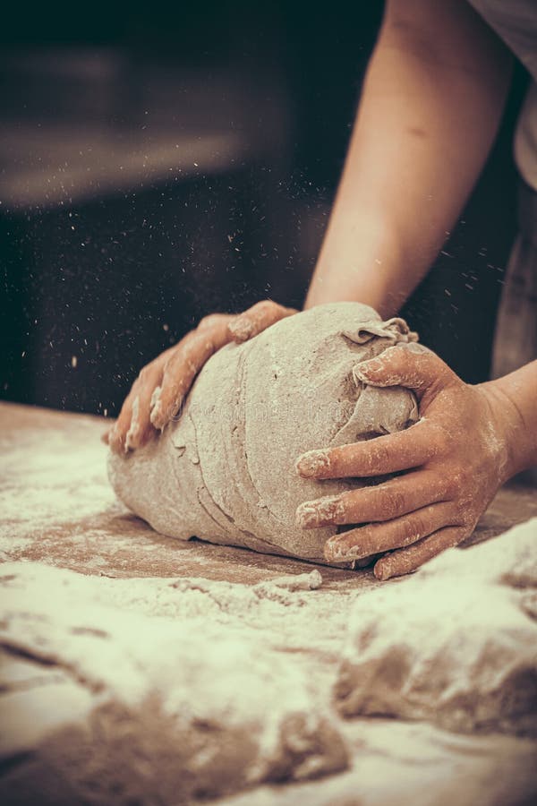 A Baker Kneads Bread Dough in the Bakery Stock Photo - Image of cook ...