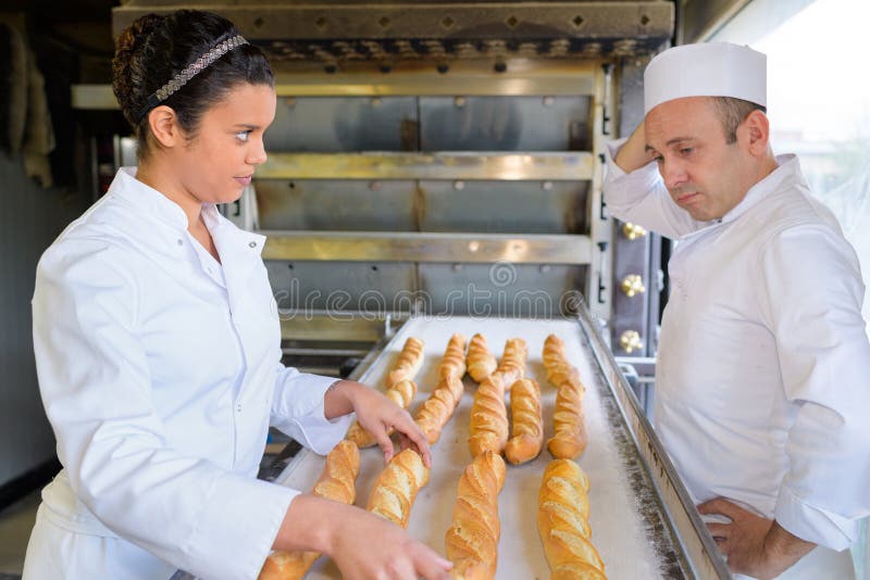 Baker Looking Disappointed by Baguettes on Tray Stock Image - Image of ...