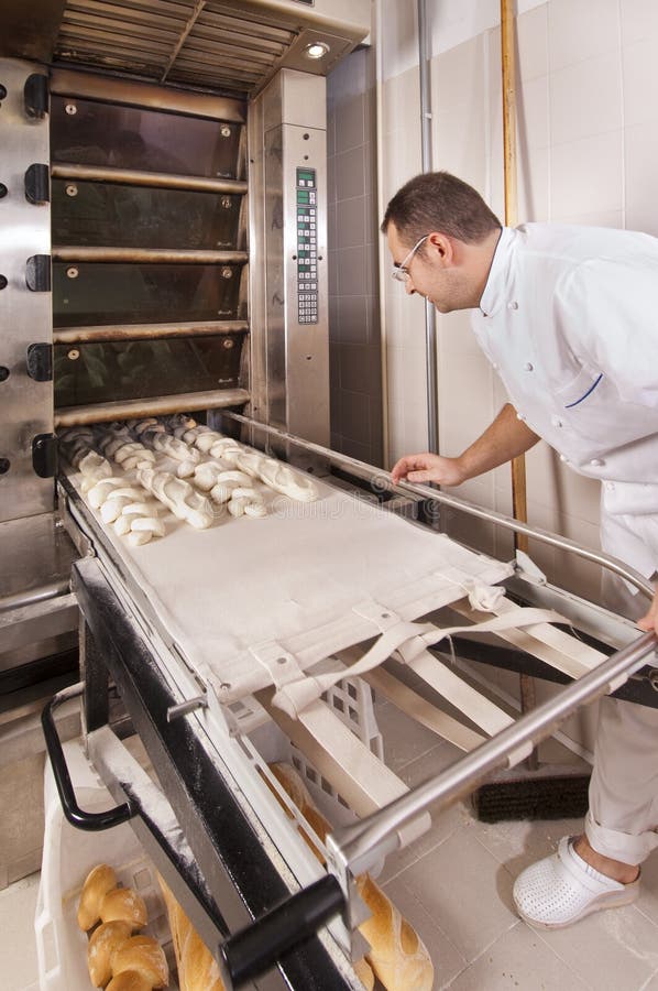 At Work in the Bakery stock image. Image of muffins, bake - 1372189