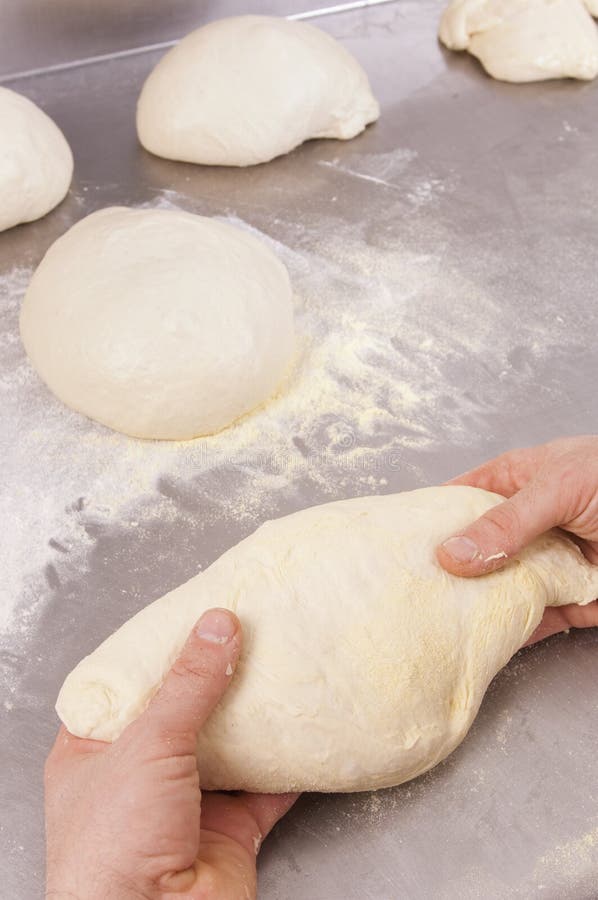 Baker makes the bread stock photo. Image of italian, flour - 24078550