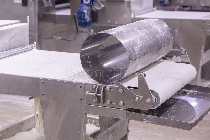 Baker Making Dough for Pastry on Dough Sheeter. Dough Rolling Machine ...