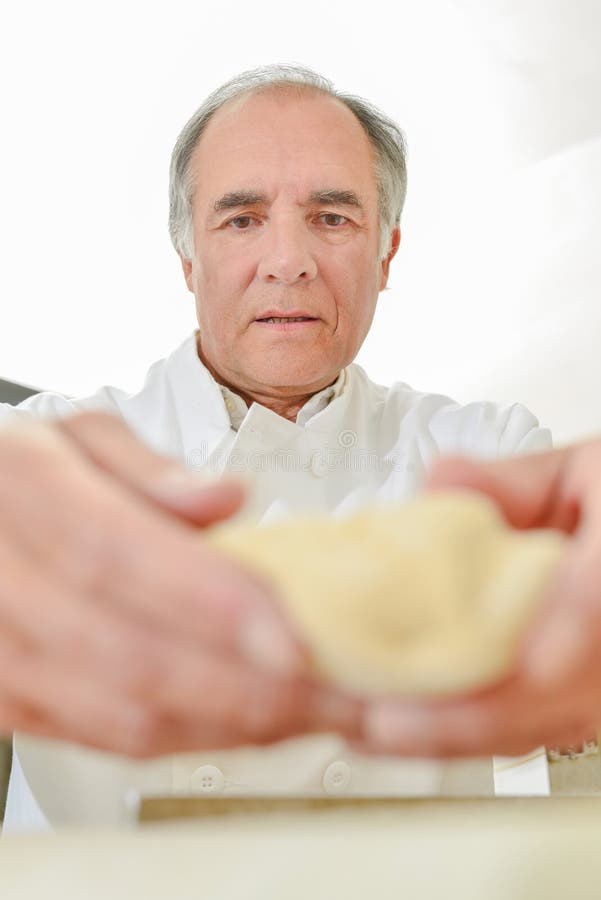 Baker making pastry stock photo. Image of care, traditional - 180839564
