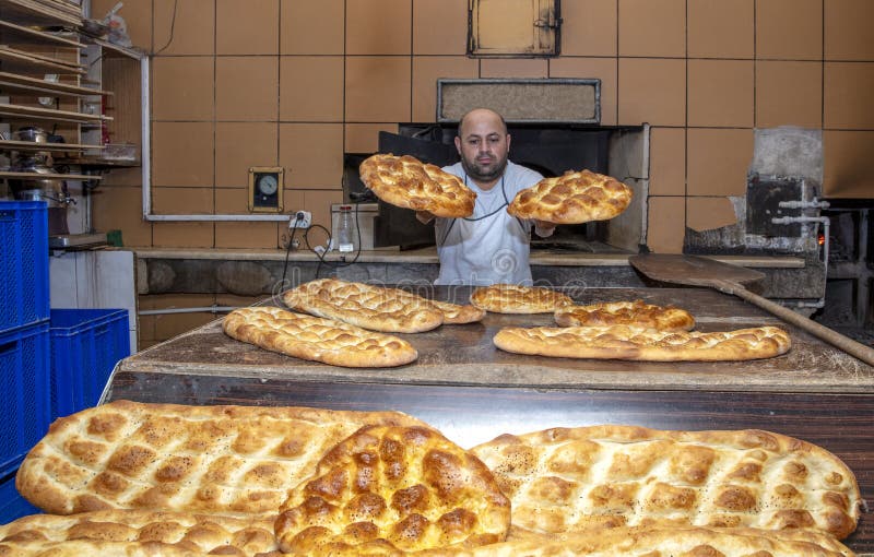 A Baker Making Turkish Pita Bread. Baker Taking Fresh Turkish Pita ...