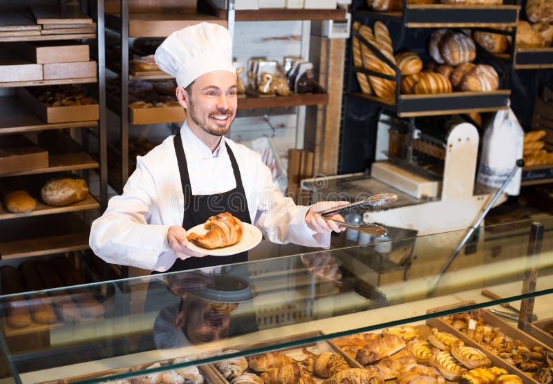 Baker is Offering Fresh Tasty Croissant Stock Image - Image of offering ...