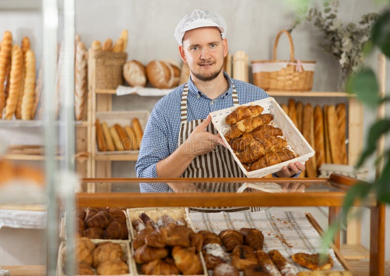Baker Places Hot Croissants on Display in Shop Stock Image - Image of ...