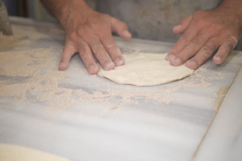 Baker Prepares Dough for Fresh Bread in a Bakery Stock Photo - Image of ...