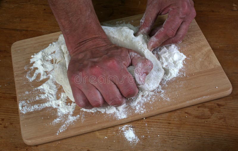 Baker Preparing Some Dough Ready To Bake Some Bread Stock Photo - Image ...