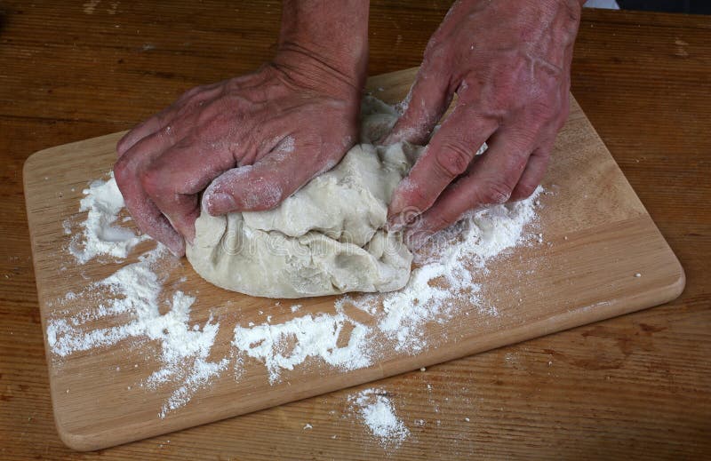 Baker Preparing Some Dough Ready To Bake Some Bread Stock Photo - Image ...