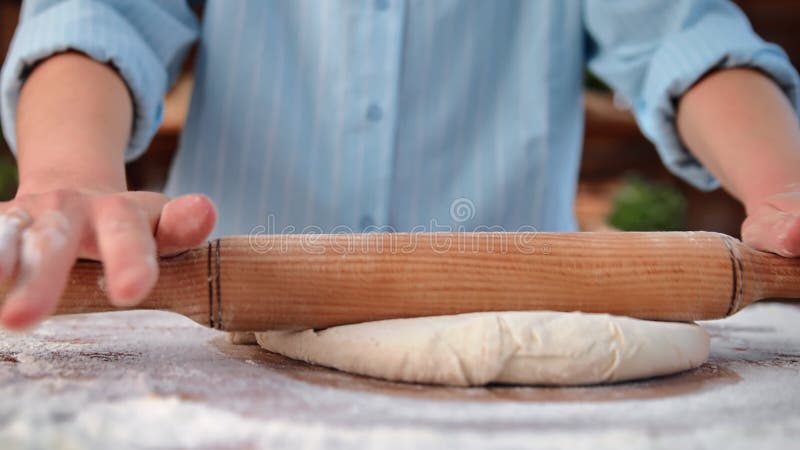 Baker Rolling Raw Dough on Table in Home Kitchen or Professional Bakery ...