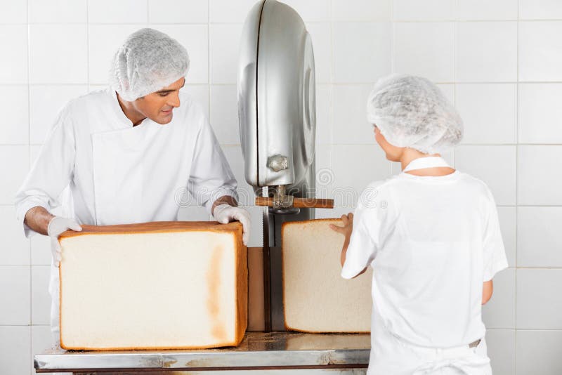 Baker S Using Cutting Machine in Bakery Stock Image - Image of cutting ...