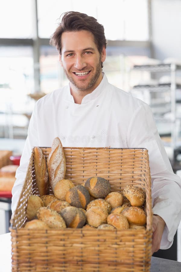 Baker Showing Basket of Bread Stock Photo - Image of professional ...