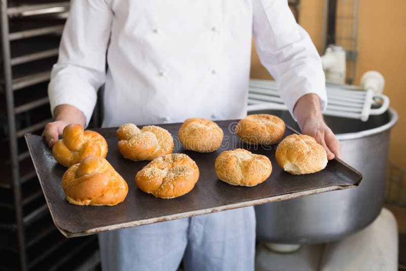 Baker Showing Tray of Rolls Stock Image - Image of profession, staff ...