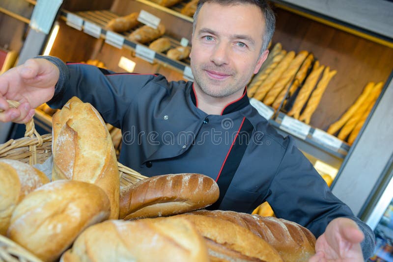 Baker Showing Variety Breads Stock Image - Image of bakery, display ...