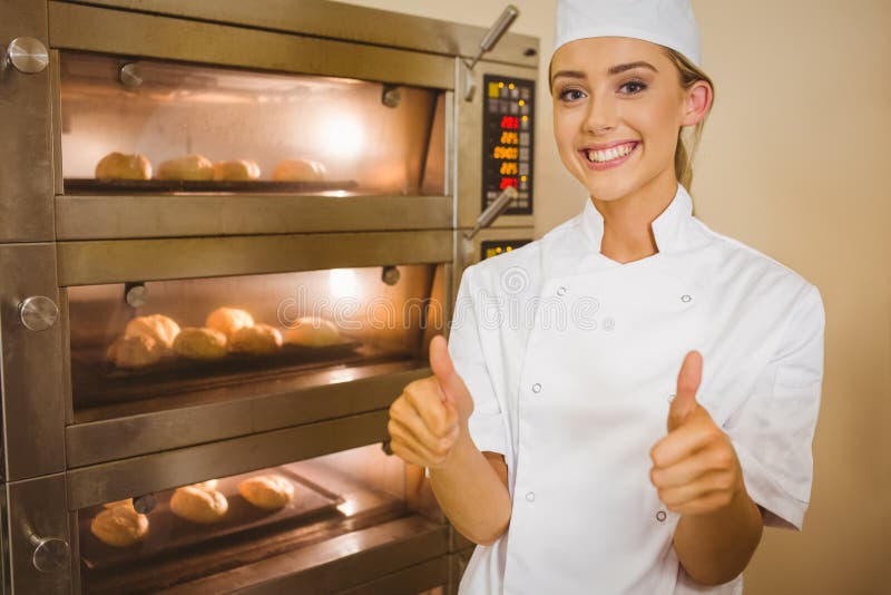 Baker Smiling at Camera beside Oven Stock Photo - Image of staff ...
