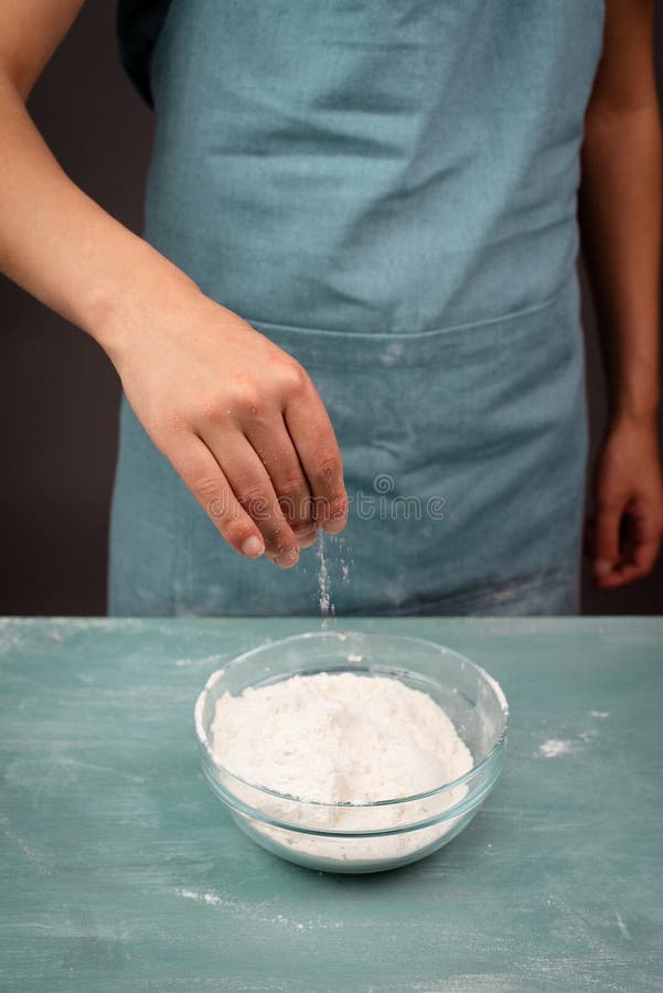 Baker Sprinkle Salt into the Wheat Flour, Baking Ingredient for Bread ...